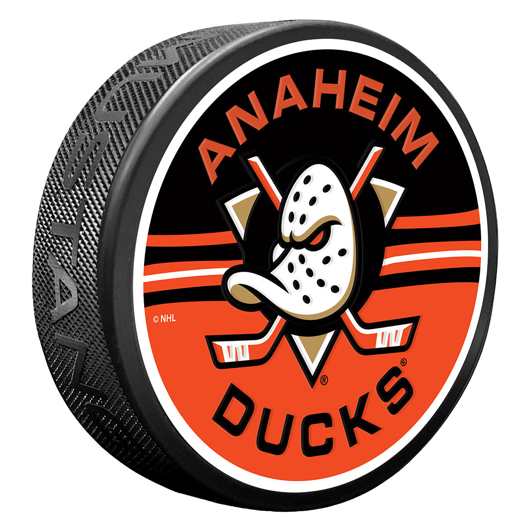Anaheim Ducks Puck - Half & Half | Sports Decor – Hockey Hall of Fame